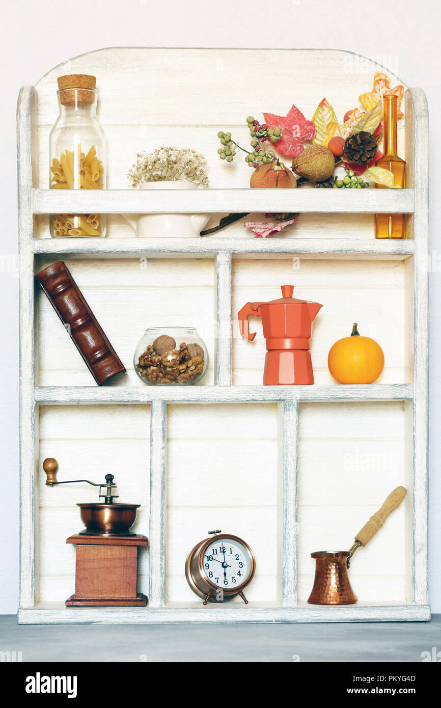 kitchen wooden white cupboard background with utensils and food Stock ...