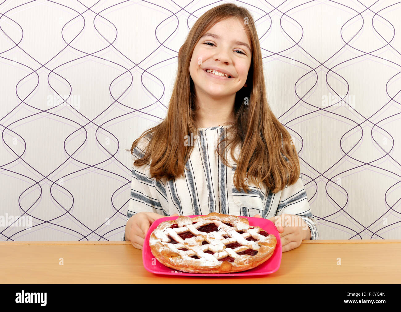 happy little girl with cherry pie Stock Photo - Alamy