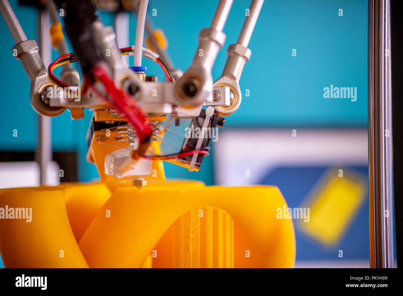 Print orange parts on a 3D printer Stock Photo - Alamy