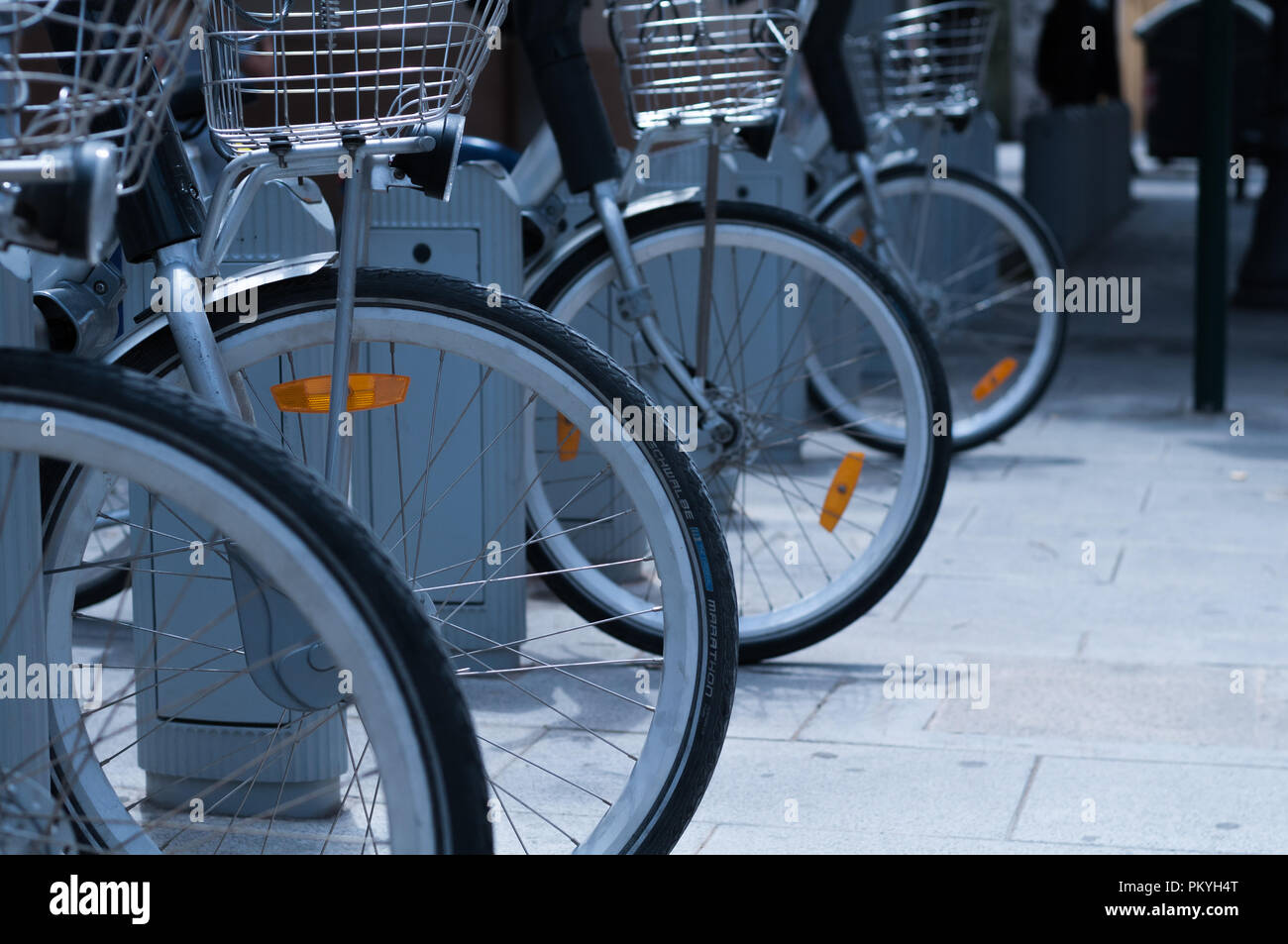 side view to the Parking lot of city bikes Stock Photo - Alamy