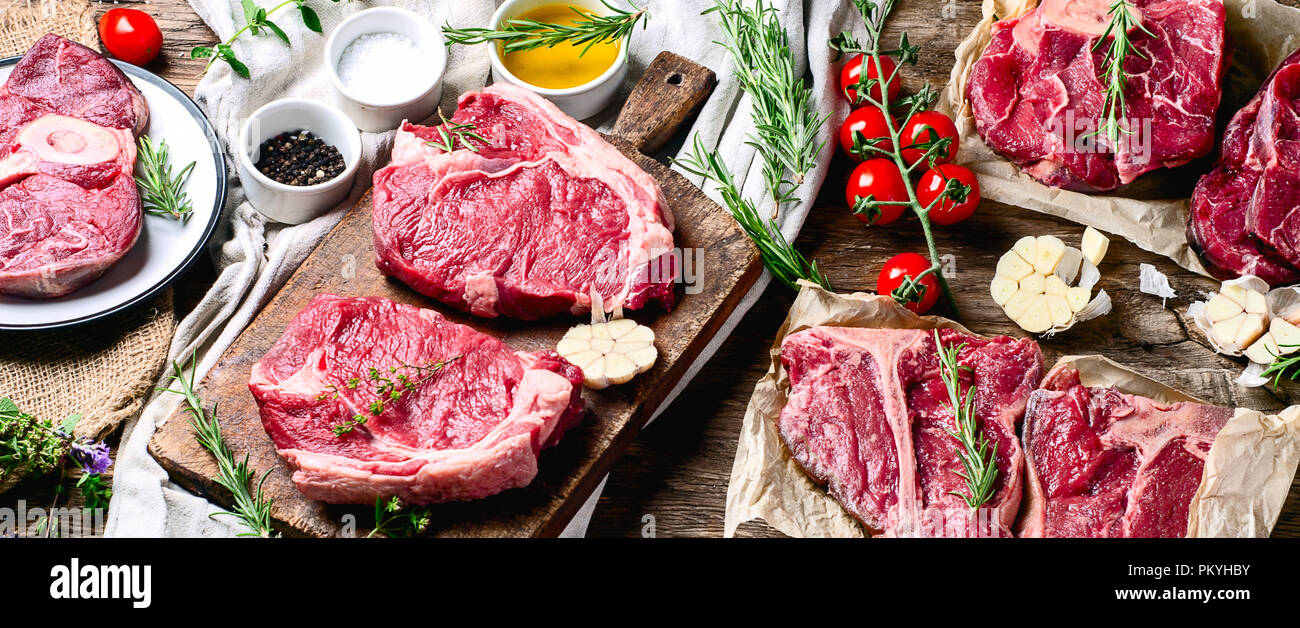 Diffrent cuts of beef ready for cooking. Top view. Panorama Stock Photo ...