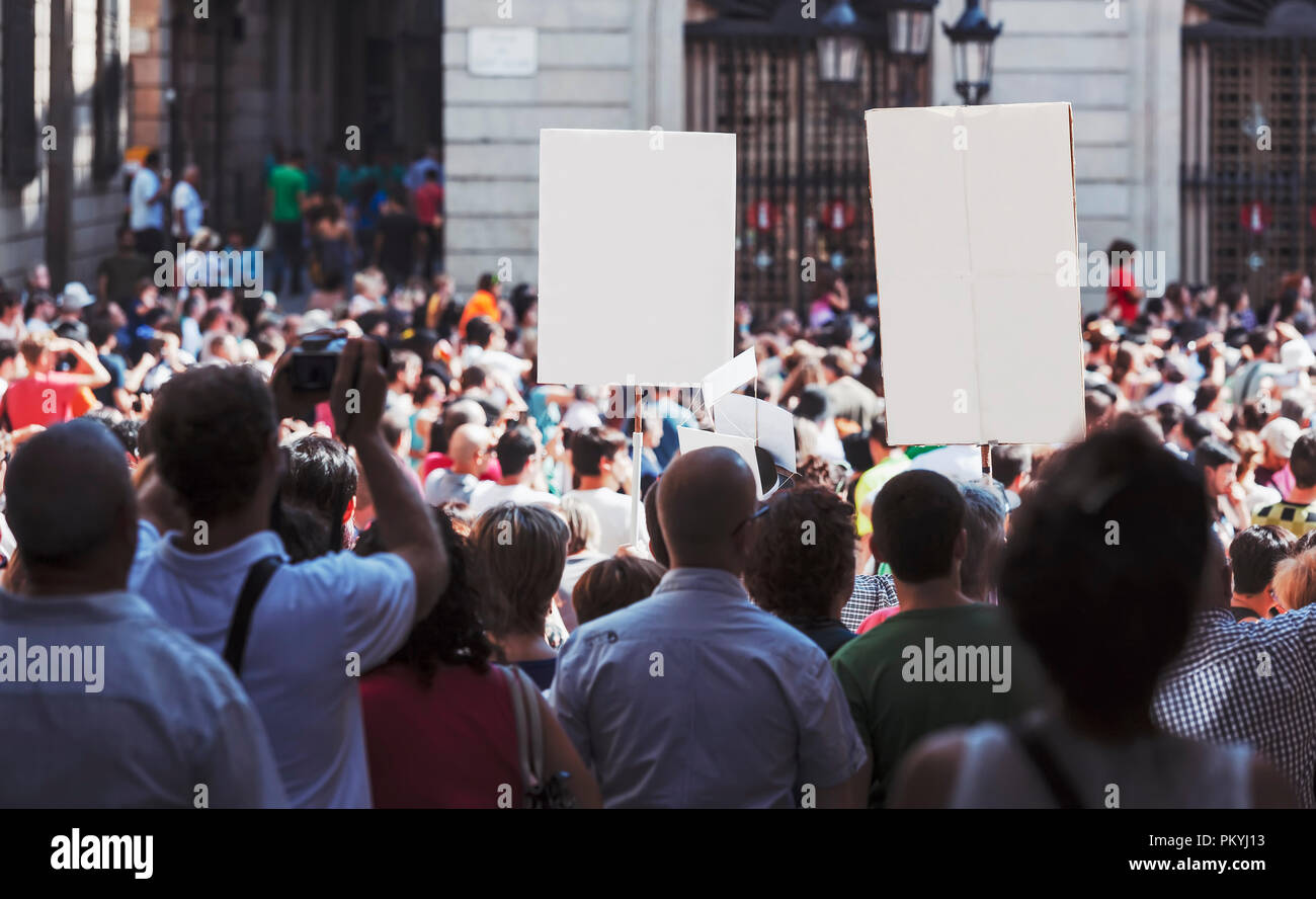 Protesting demonstration holding signs in Barcelona Stock Photo - Alamy