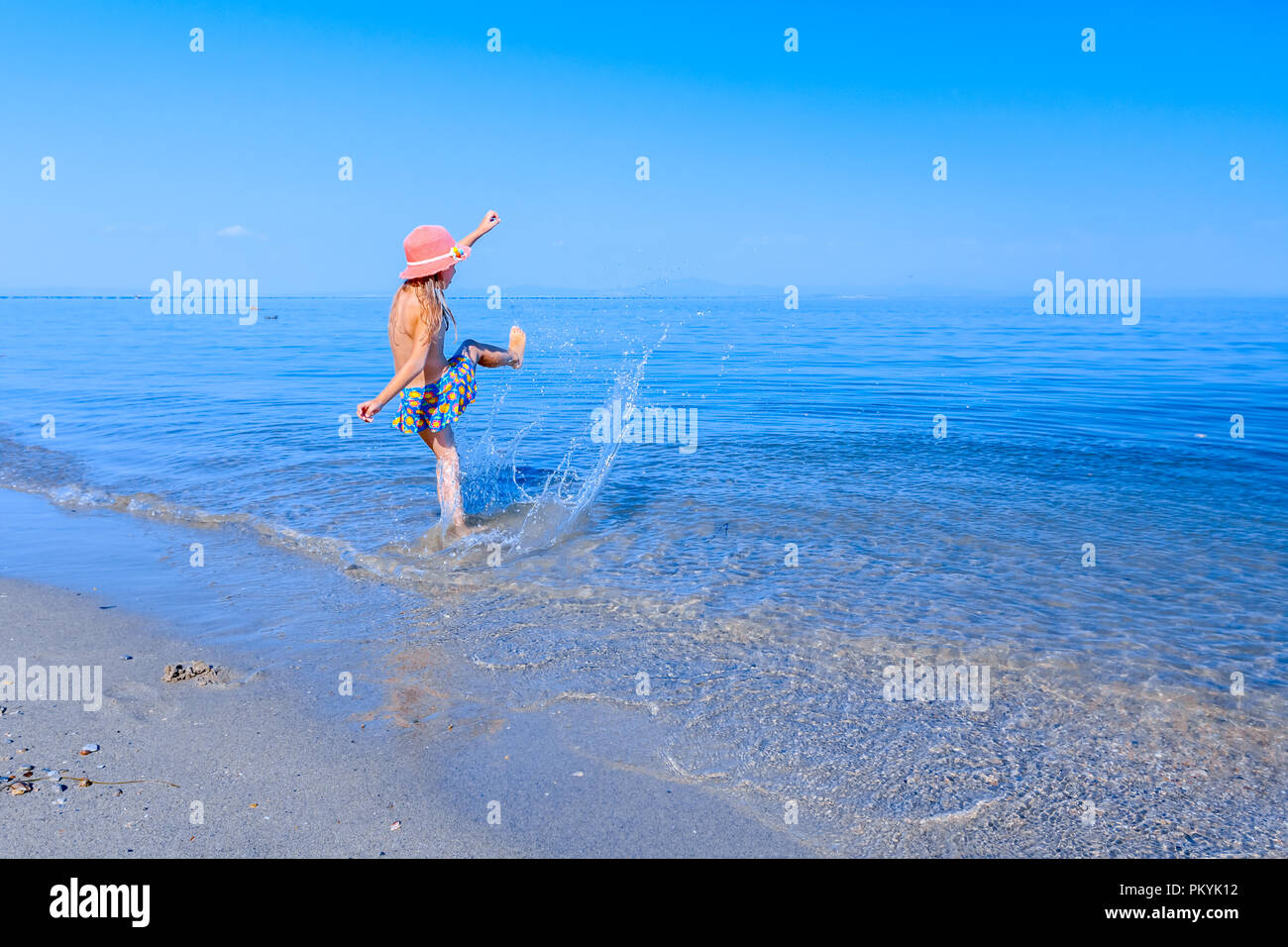 Bikini woman child in shallow hi-res stock photography and images - Alamy