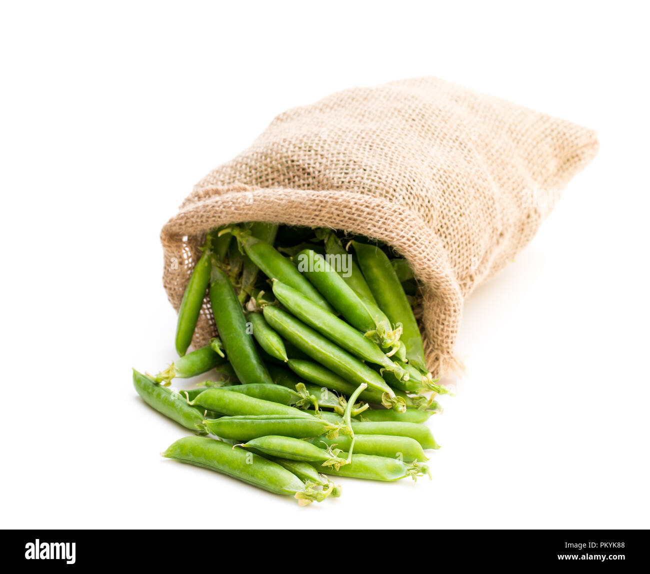 Fresh green pea pods in sack bag isolated on white Stock Photo - Alamy
