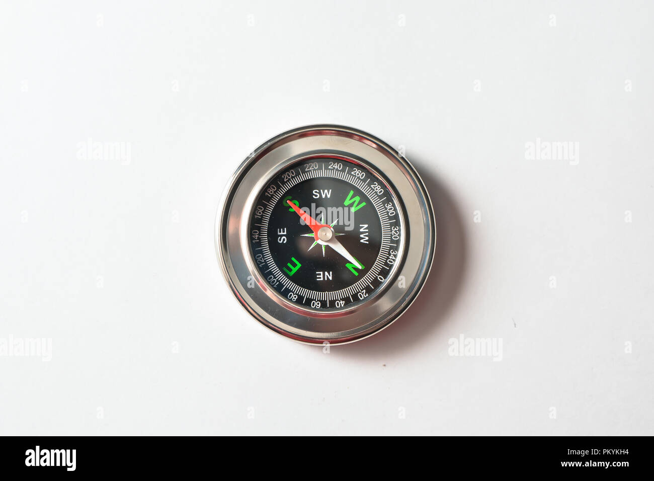 Navigation equipment for orienteering. Compass on white background ...