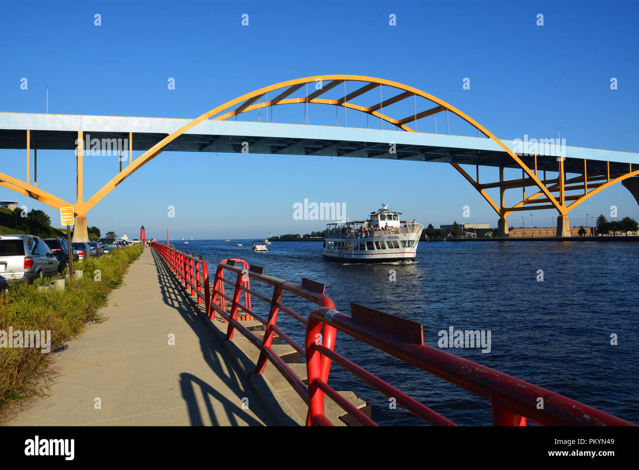 A tour boat passes beneath the Daniel Hoan Memorial Bridge on it's way ...