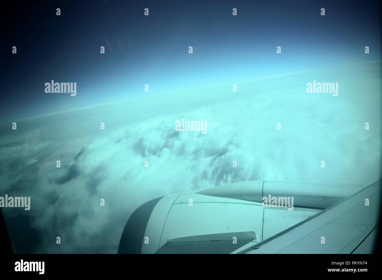 Close-up of Airplane Wing and engine in Mid Air Stock Photo - Alamy