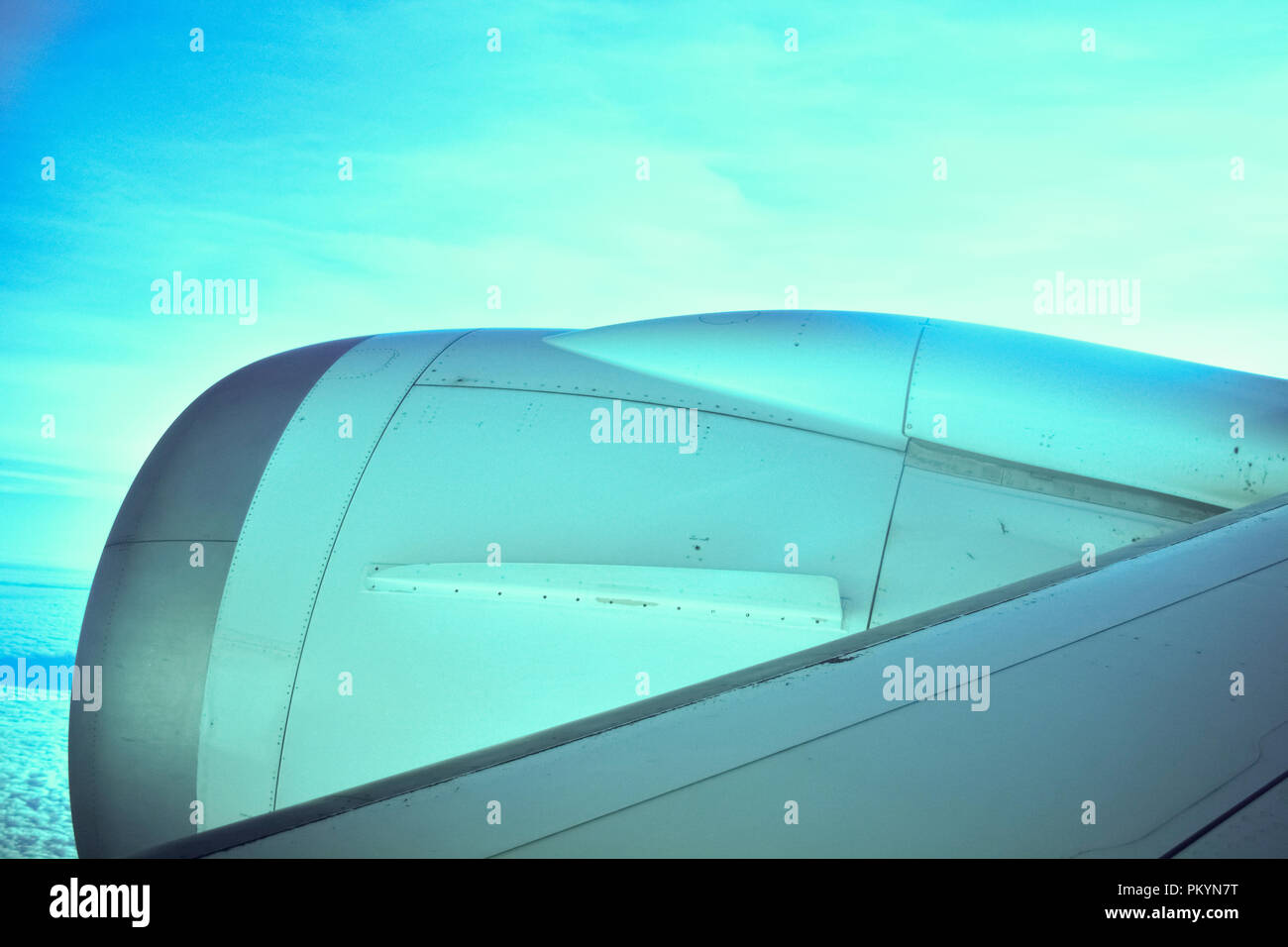 Close-up of Airplane Wing and engine in Mid Air Stock Photo - Alamy