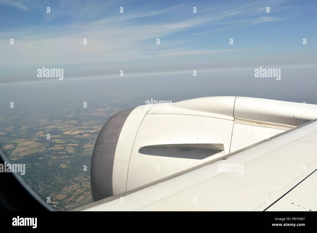 Close-up of Airplane Wing and engine in Mid Air Stock Photo - Alamy