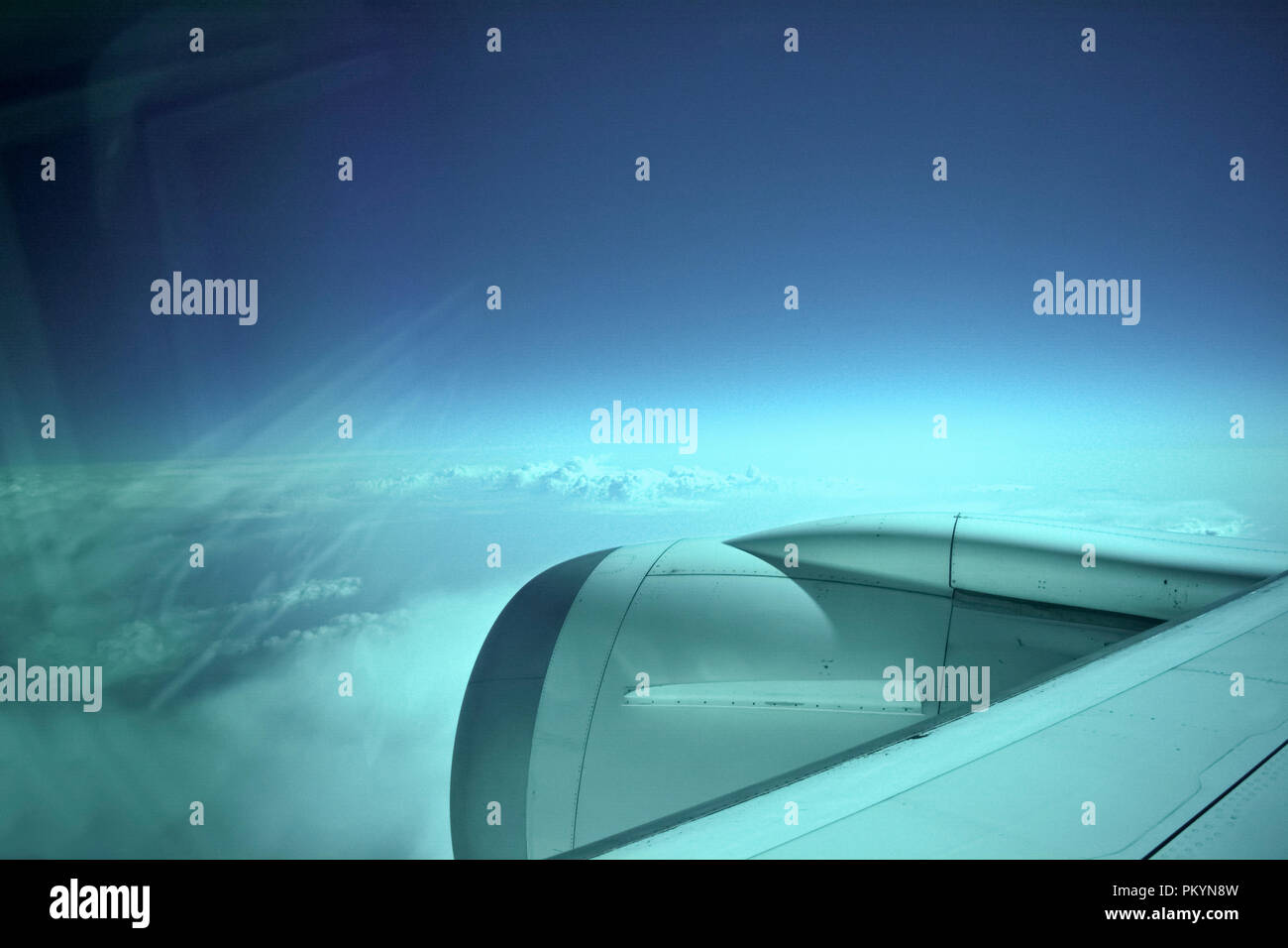 Close-up of Airplane Wing and engine in Mid Air Stock Photo - Alamy