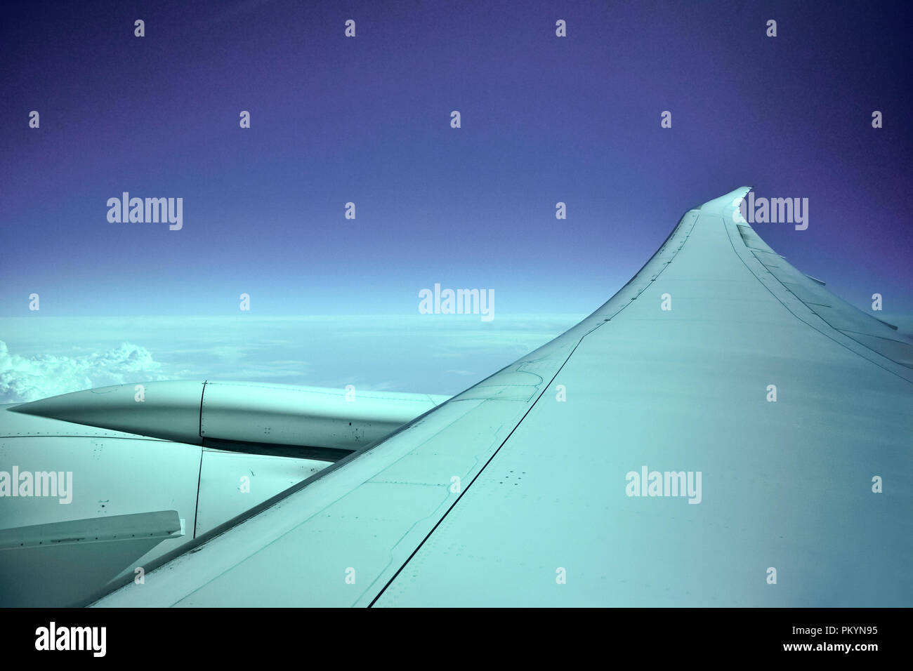 Close-up of Airplane Wing and engine in Mid Air Stock Photo - Alamy