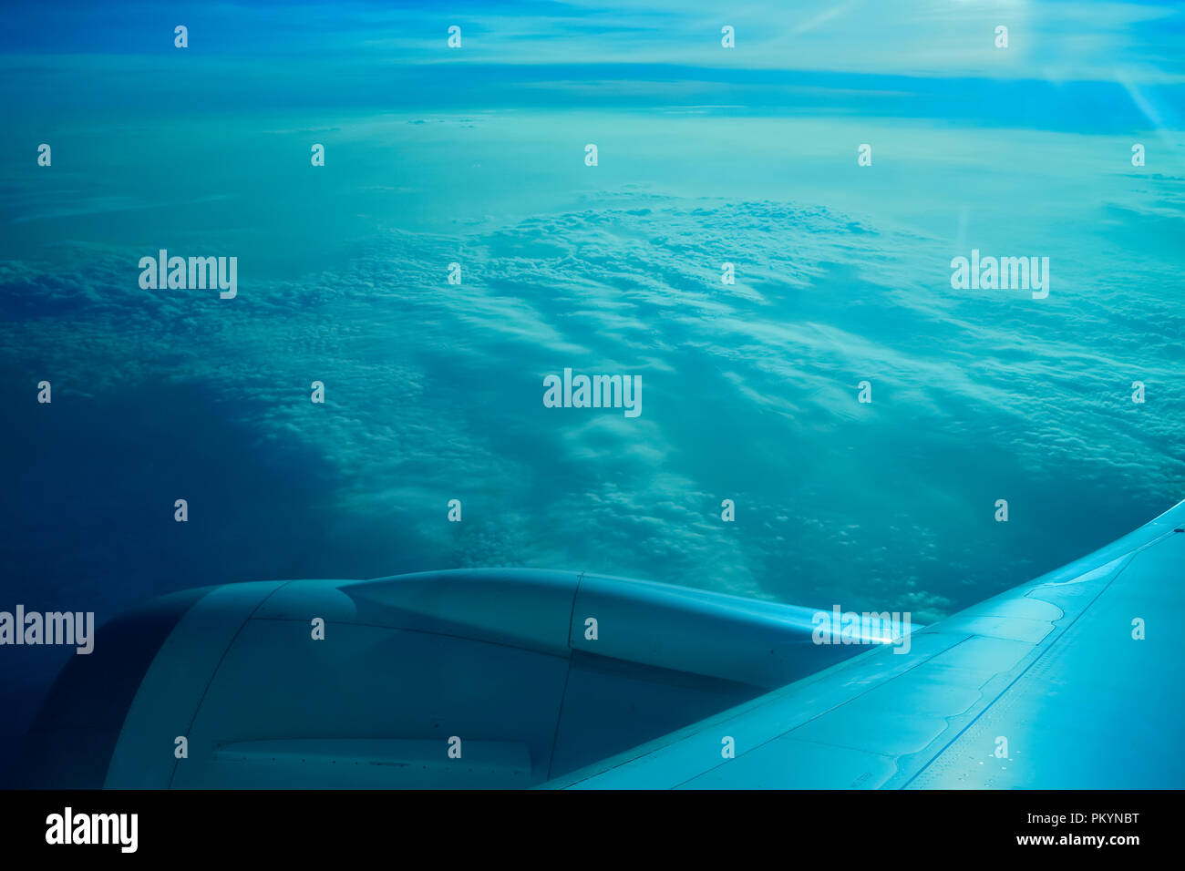 Close-up of Airplane Wing and engine in Mid Air Stock Photo - Alamy
