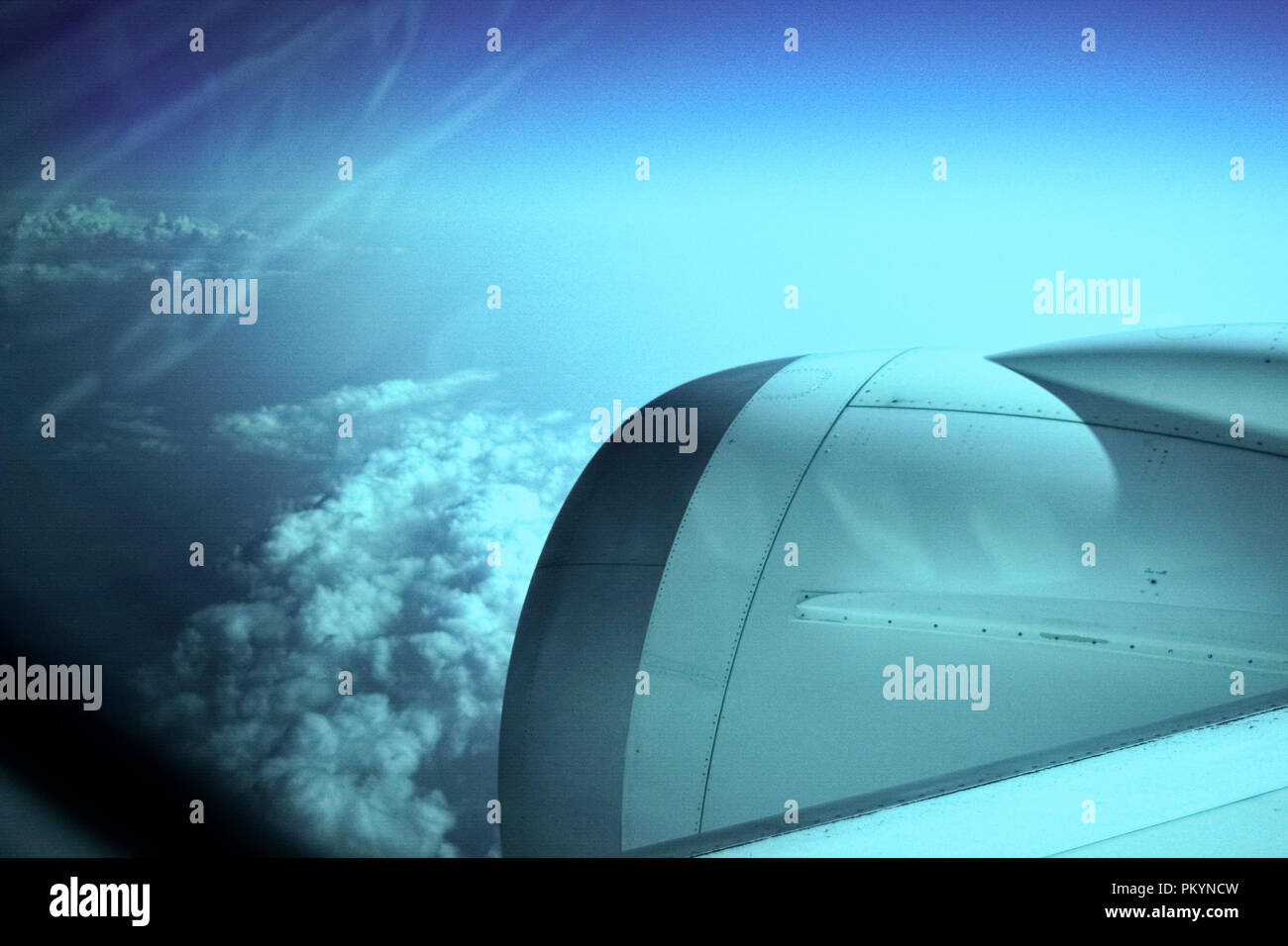 Close-up of Airplane Wing and engine in Mid Air Stock Photo - Alamy