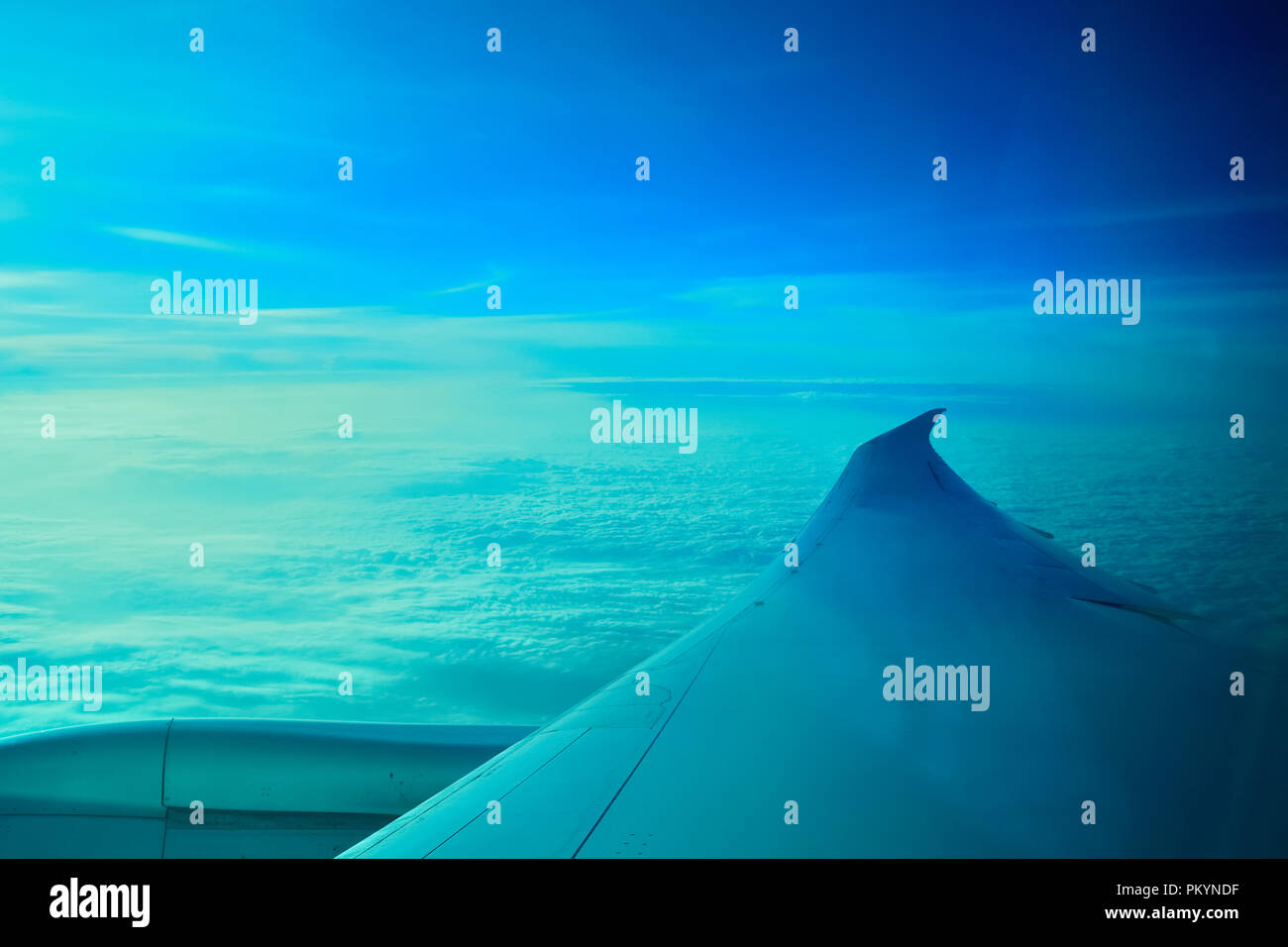 Close-up of Airplane Wing and engine in Mid Air Stock Photo - Alamy