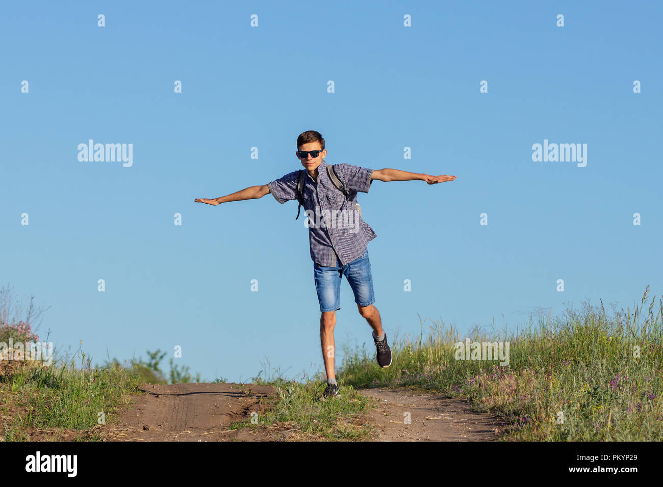 Guy jumping on road hi-res stock photography and images - Alamy