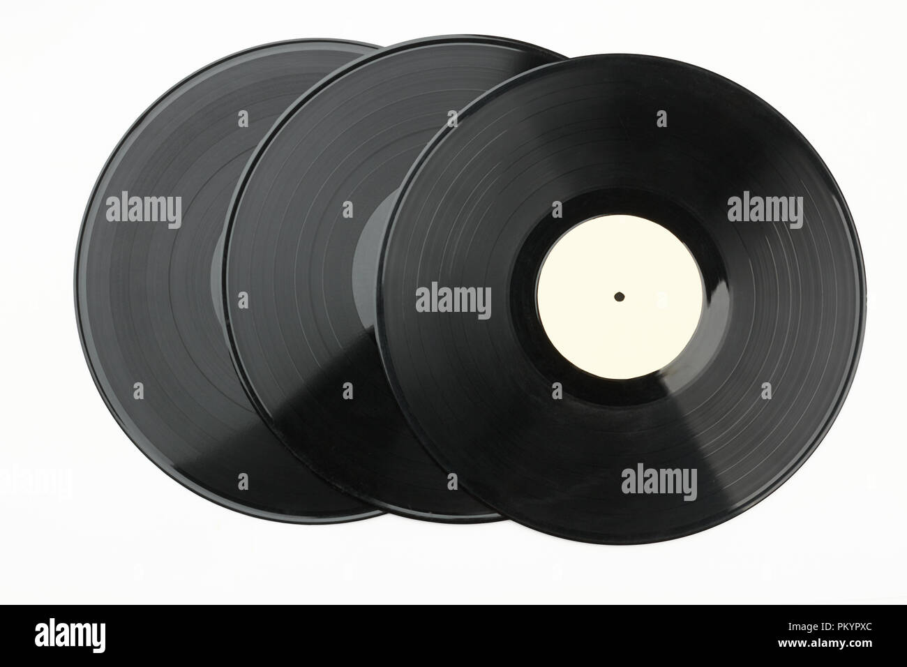 Vinyl records over white background. Three vinyl plates. Retro musical ...