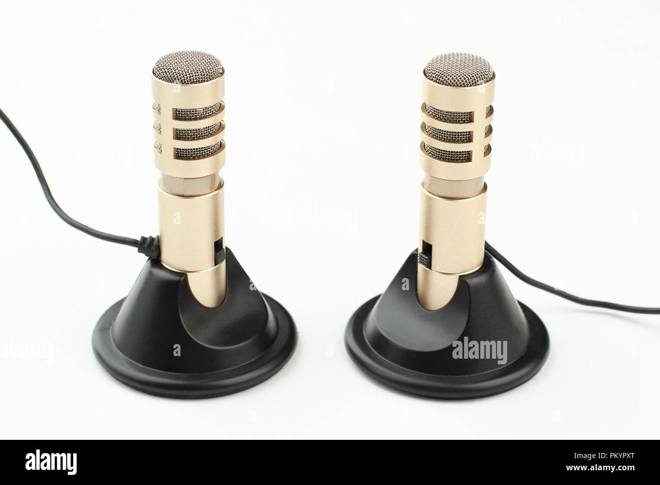 Two condenser microphones on white background. Professional stereo ...