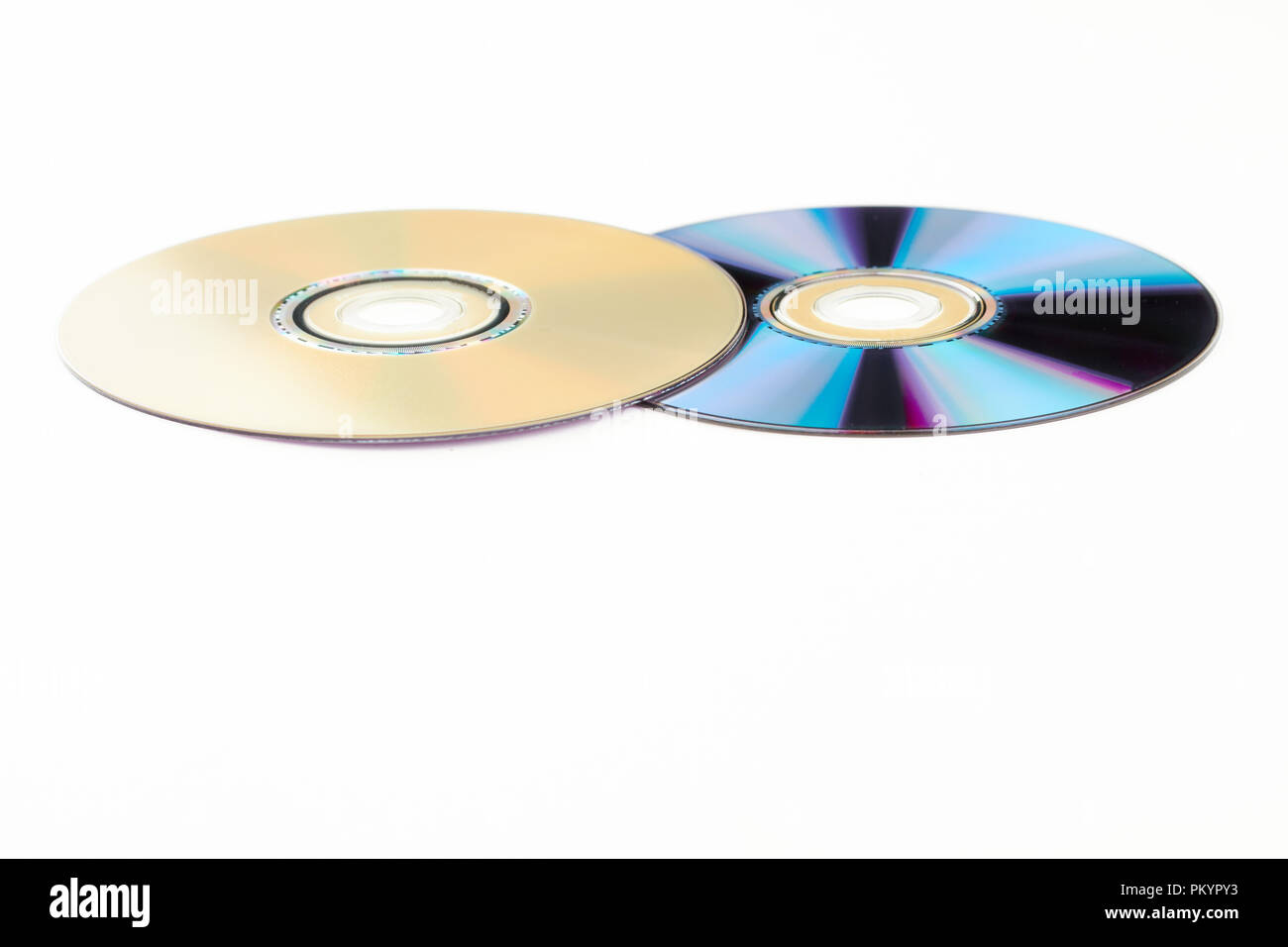 Two compact discs on white background. CD and DVD disks isolated over ...