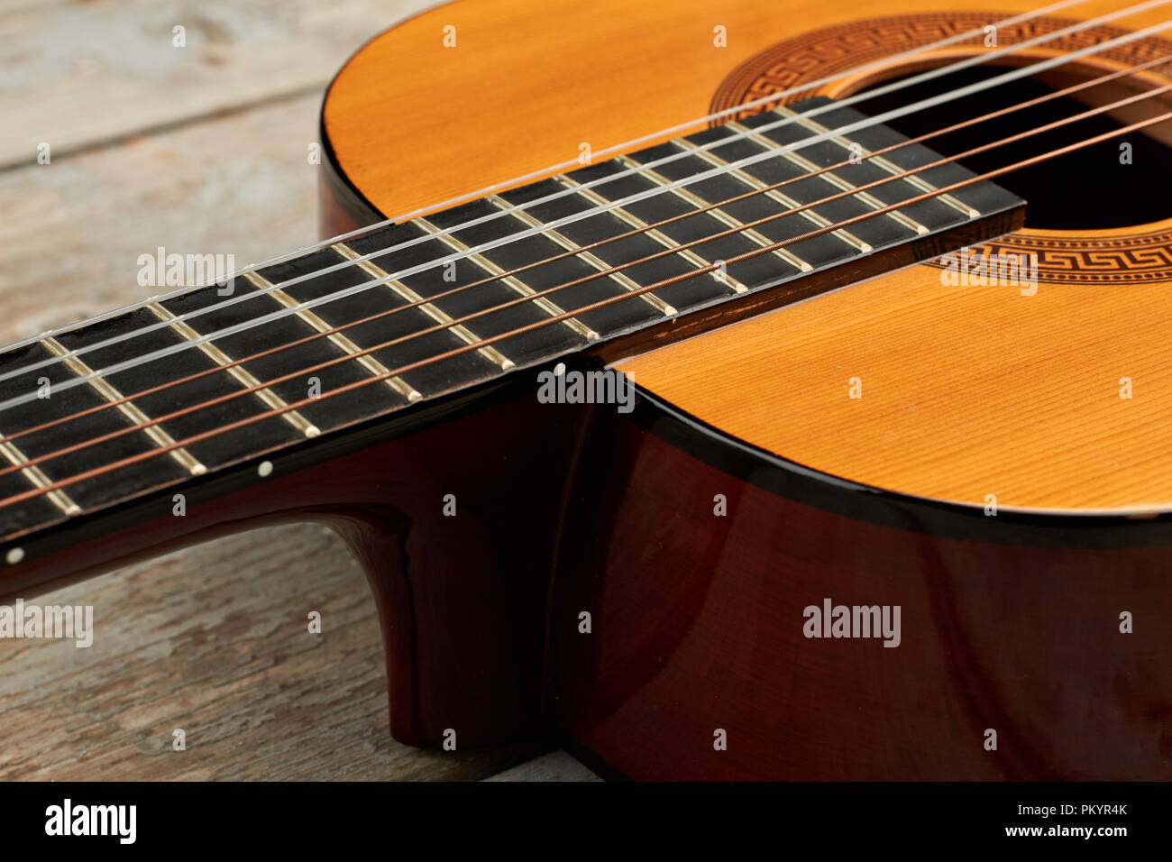 Close up acoustic guitar instrument. Detail of wooden guitar. Classical ...