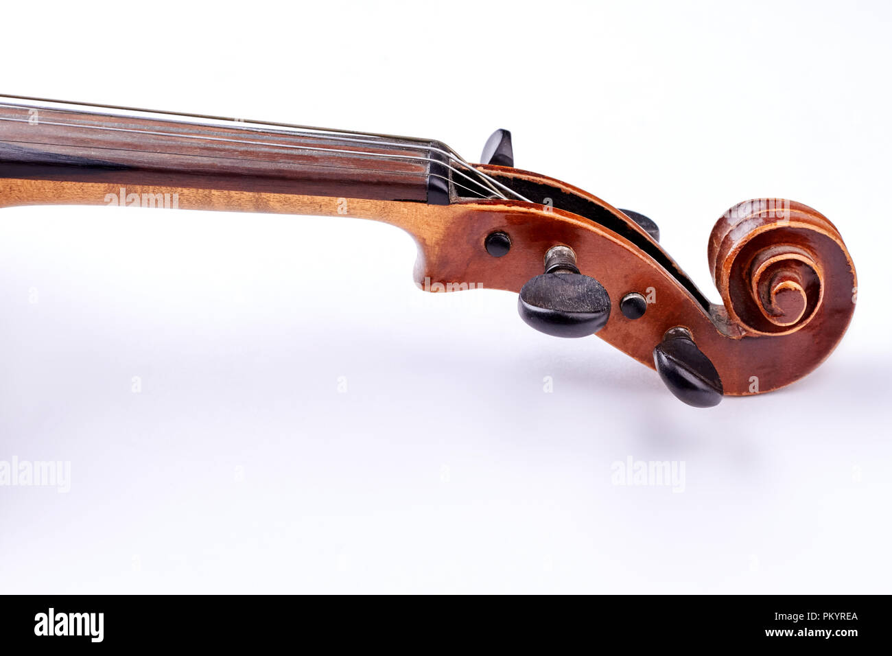 Scroll of the violin on white background Stock Photo - Alamy