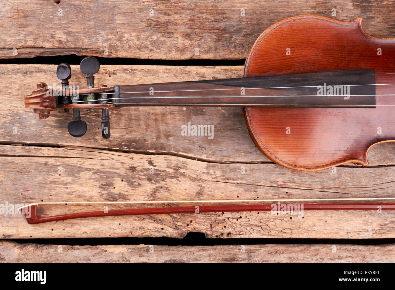 Violin and fiddle stick, cropped image Stock Photo - Alamy