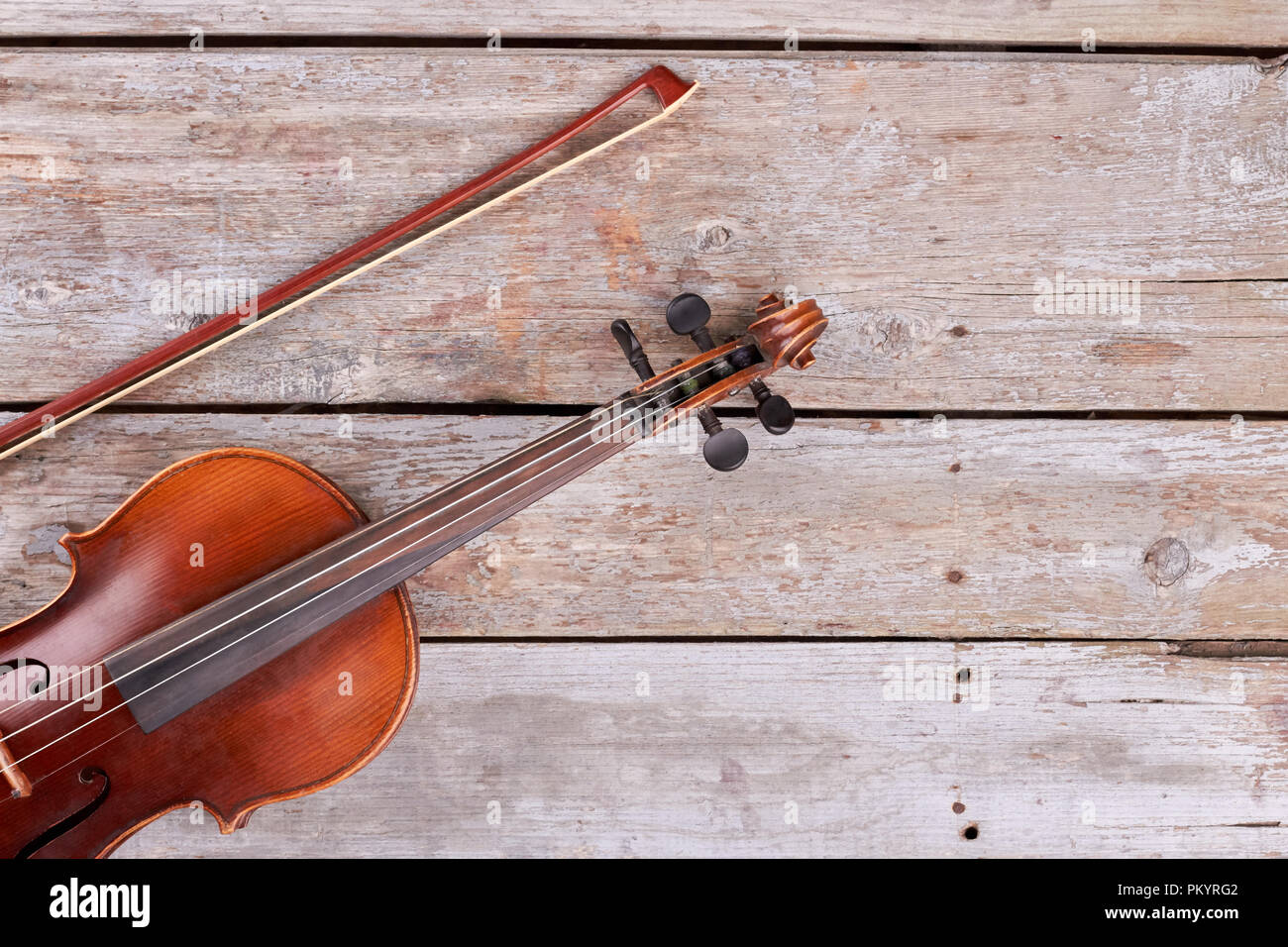 Violin and fiddle stick, cropped image Stock Photo - Alamy