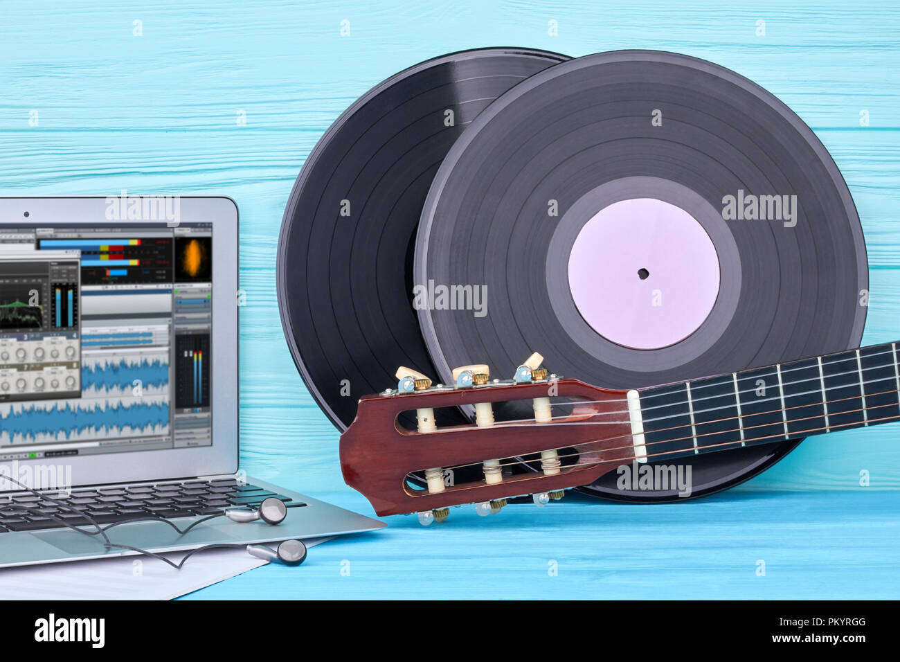 Vinyl records, guitar and laptop Stock Photo - Alamy