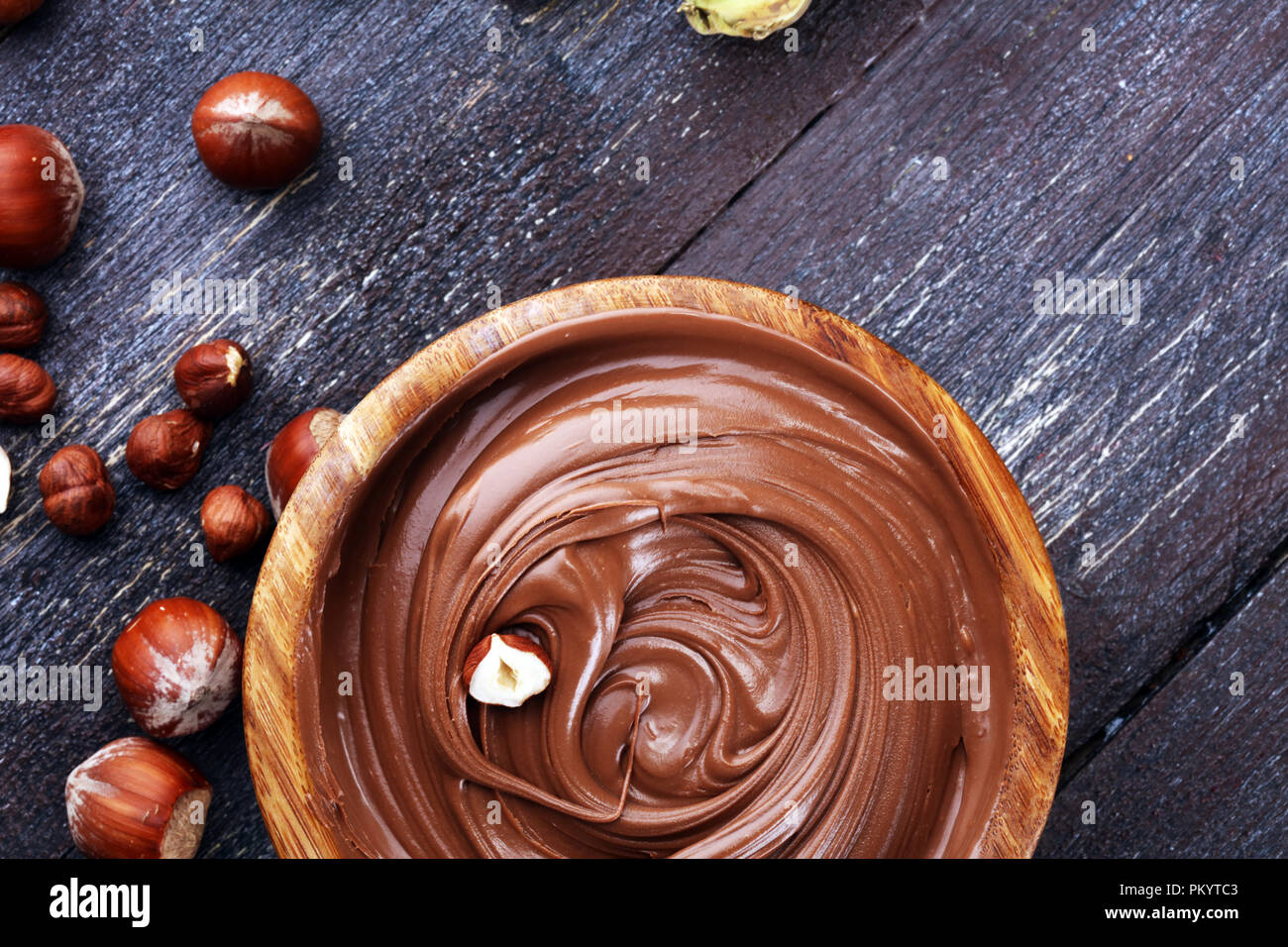 Homemade hazelnut spread in wooden bowl. Hazelnut Nougat cream Stock ...