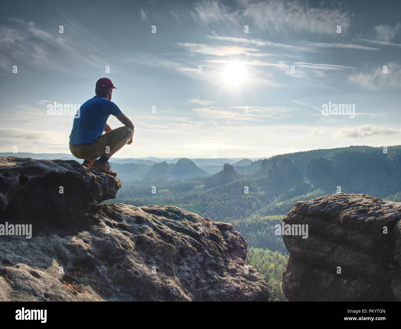 Hiker watching to Sun at horizon. Beautiful moment the miracle of ...