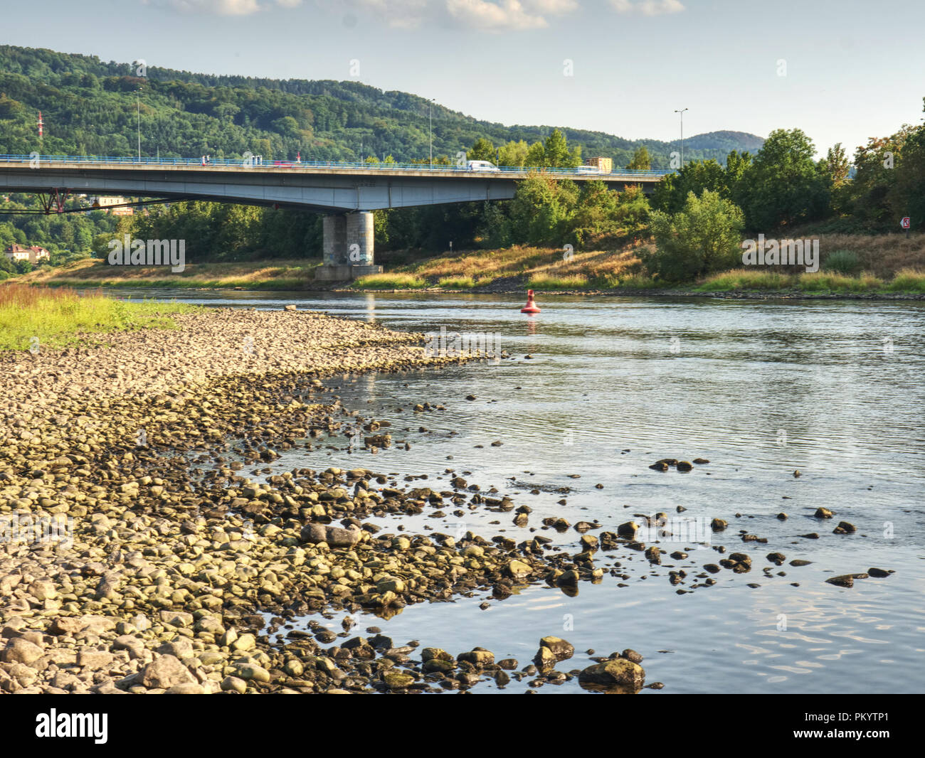 Empty river. Drying out of big river. Horrible smell of poisoned muddy ...