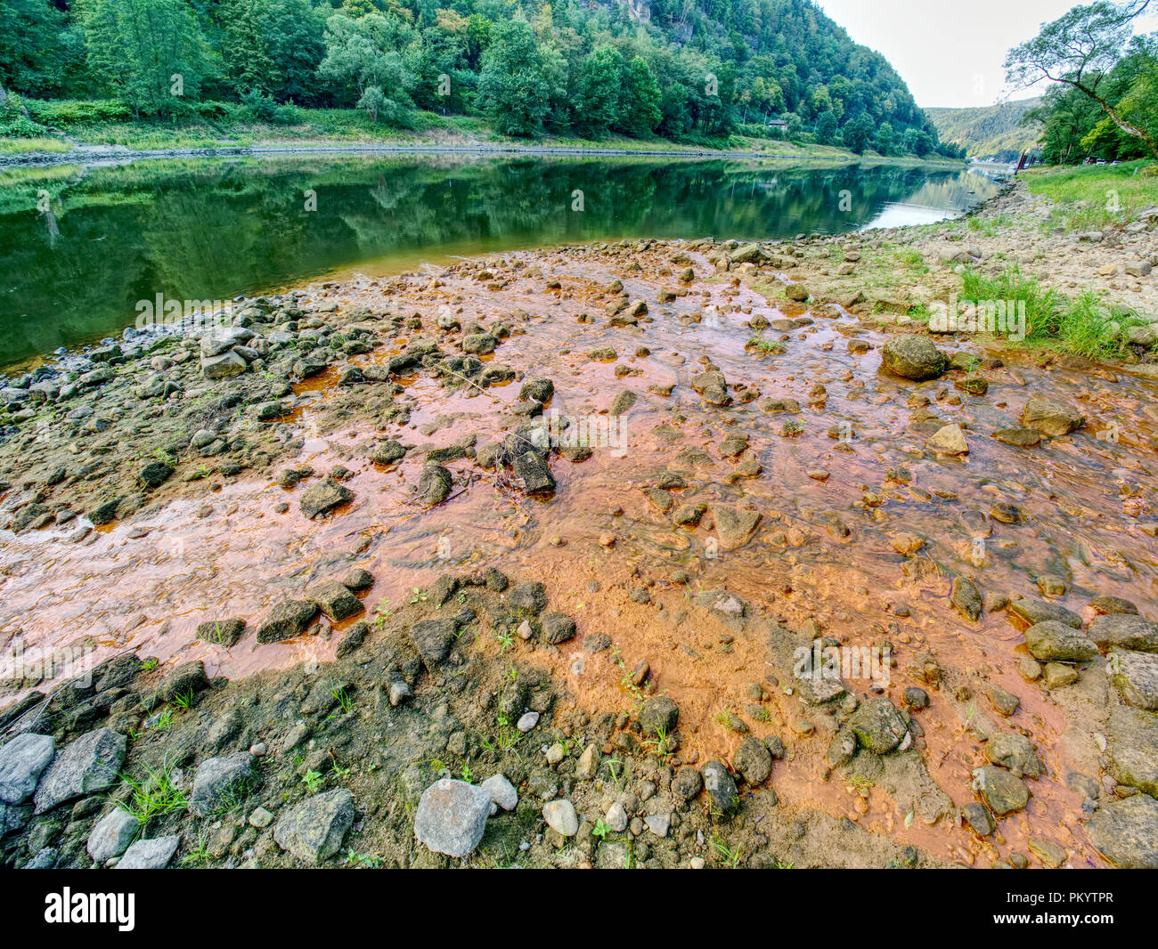 Low water level, empty river inflow. Muddy horrible smell water ...