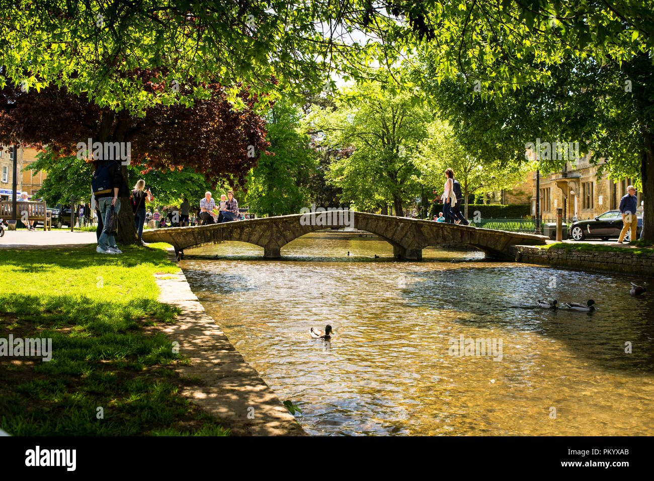 Burton-on-the-Water arched stone footbridges on the River Windrush in ...