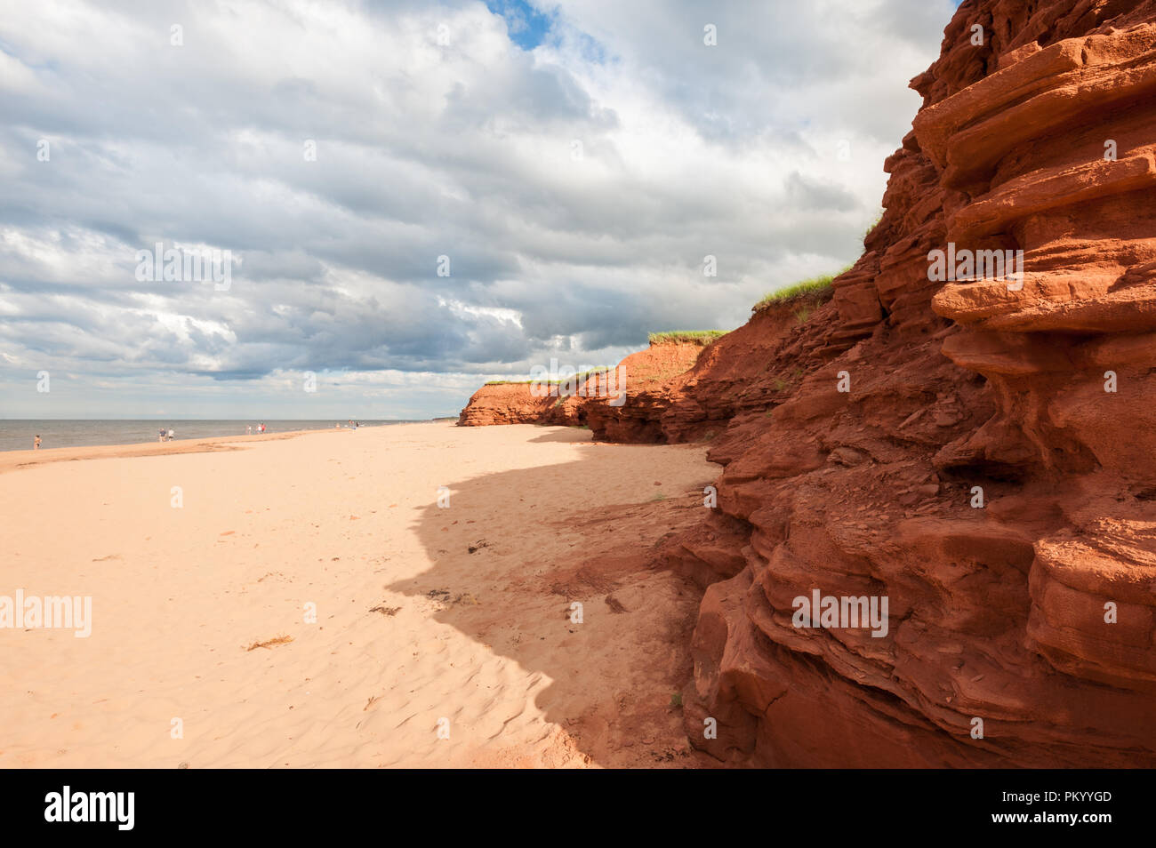 Red sandstone and beach at Thunder Cove, Prince Edward Island, Canada ...
