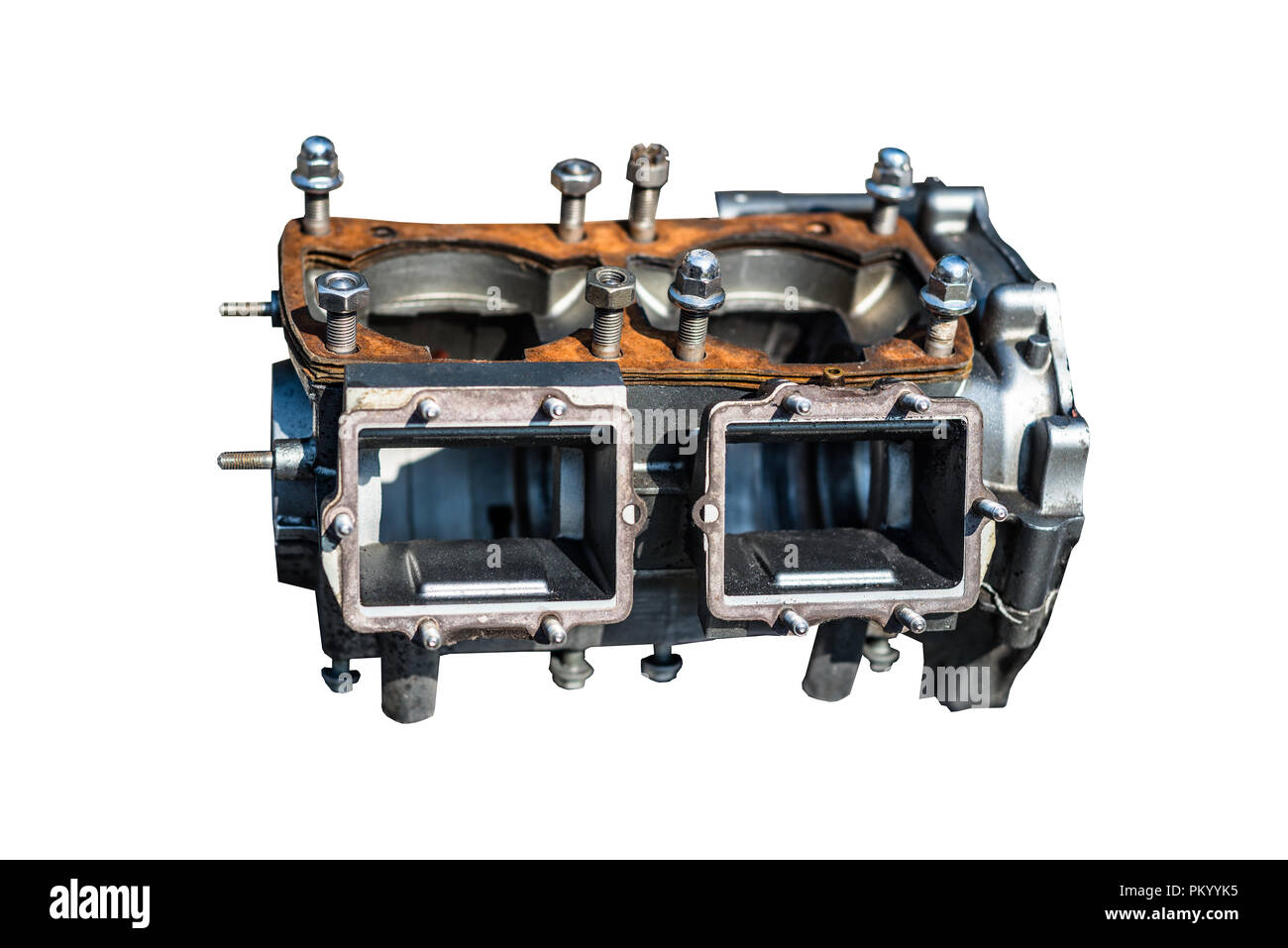 A disassembled block of a two-cylinder engine isolated on a white ...