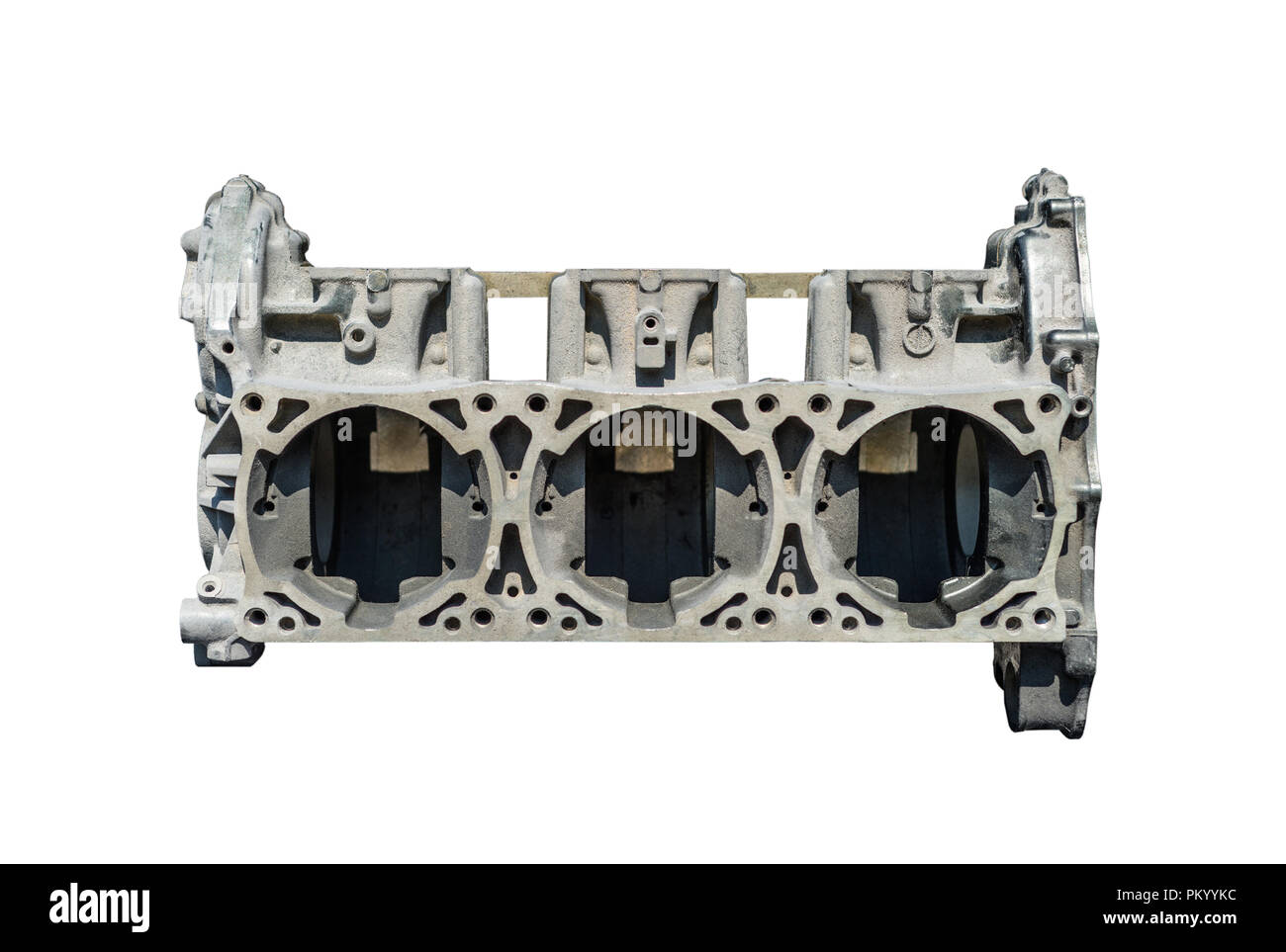 A disassembled of a three-cylinder engine block isolated on a white ...