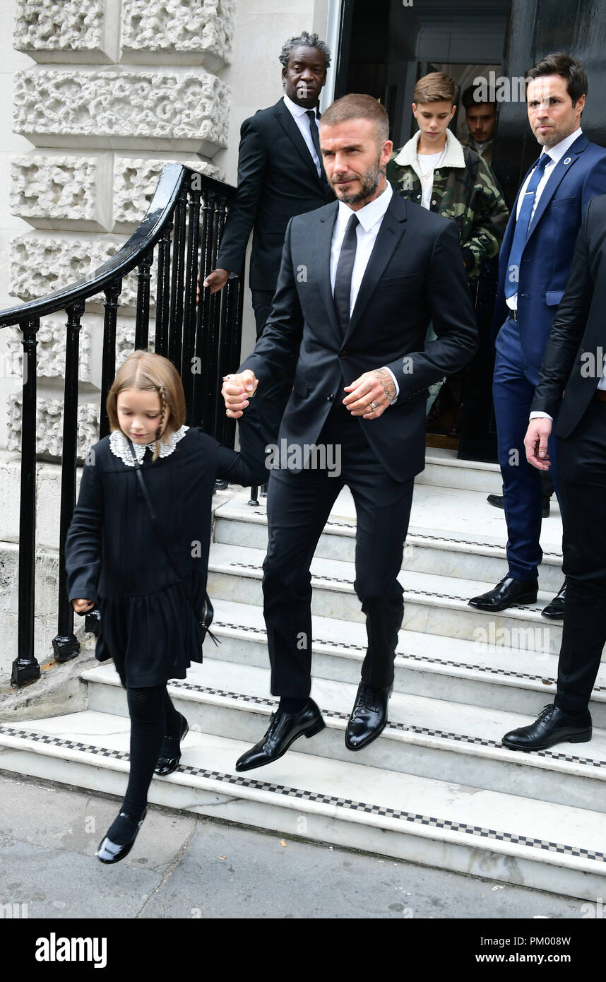 David Beckham and his children Harper (left), Romeo (camouflage jacket ...