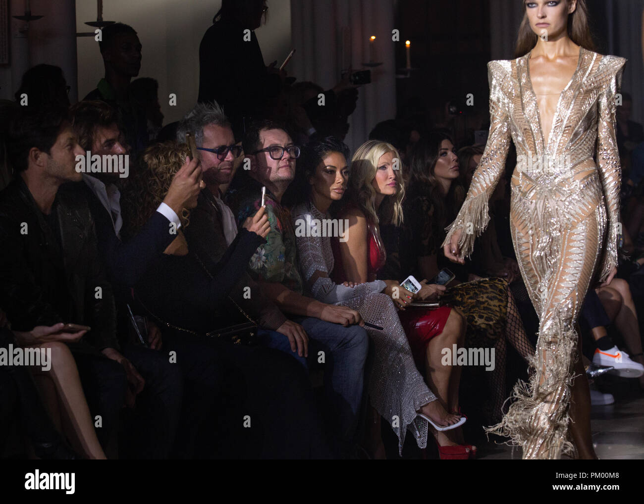 Alan Carr, Nicole Scherzinger and Caprice watch models on the catwalk ...