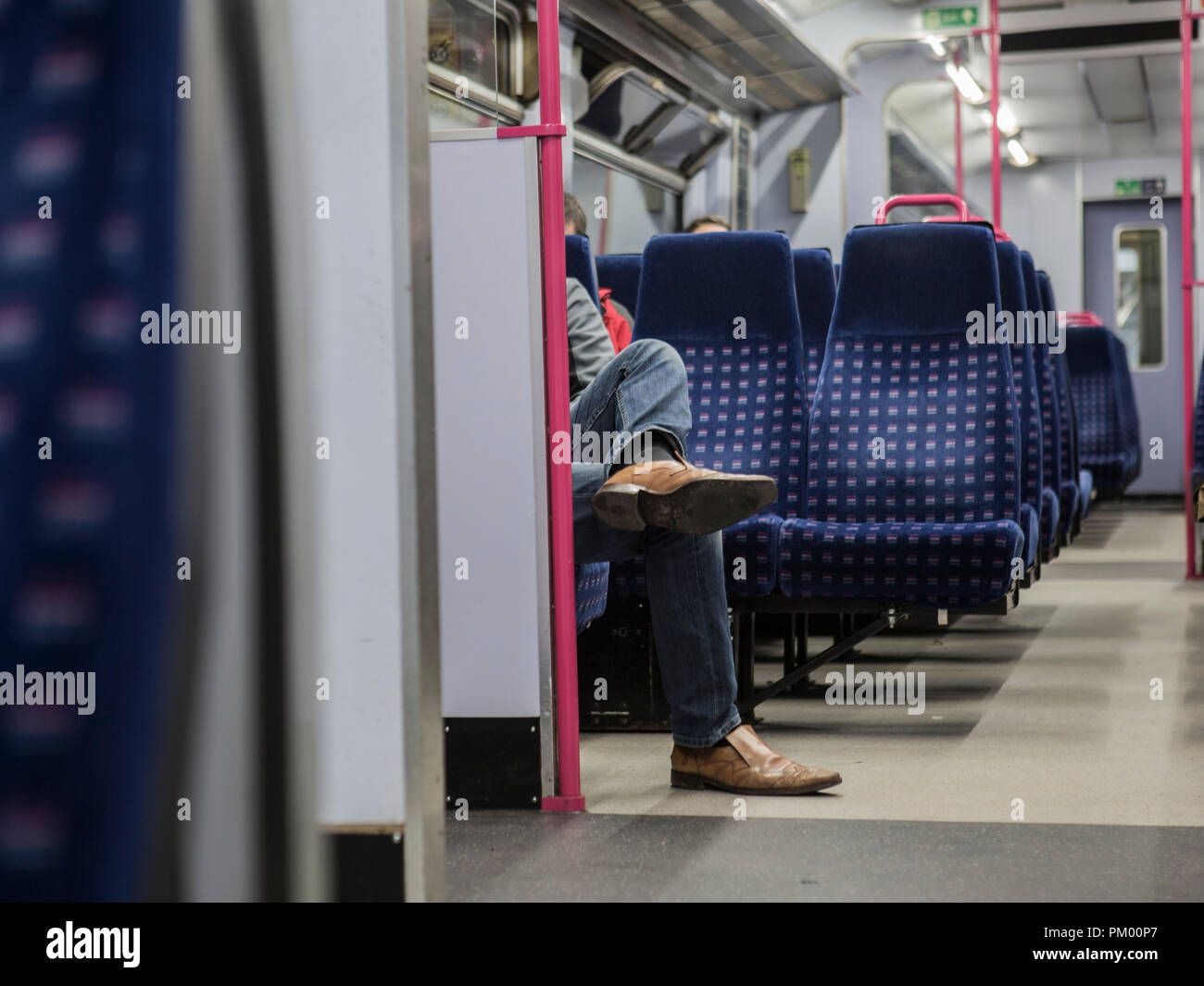 Shoes on train seat hi-res stock photography and images - Alamy