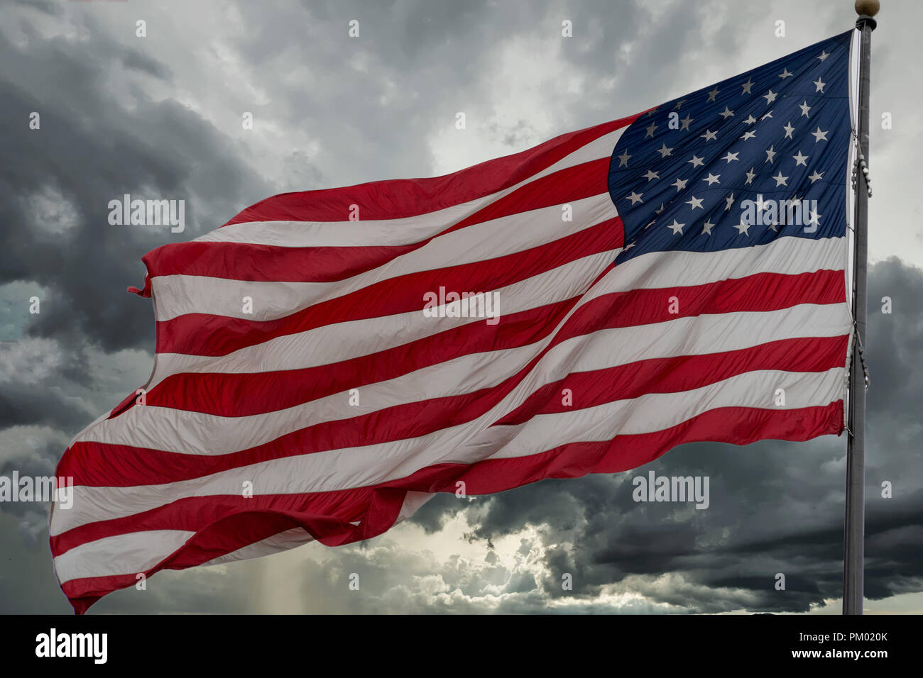 Hurricane Cyclone tempest in usa town flag Stock Photo - Alamy