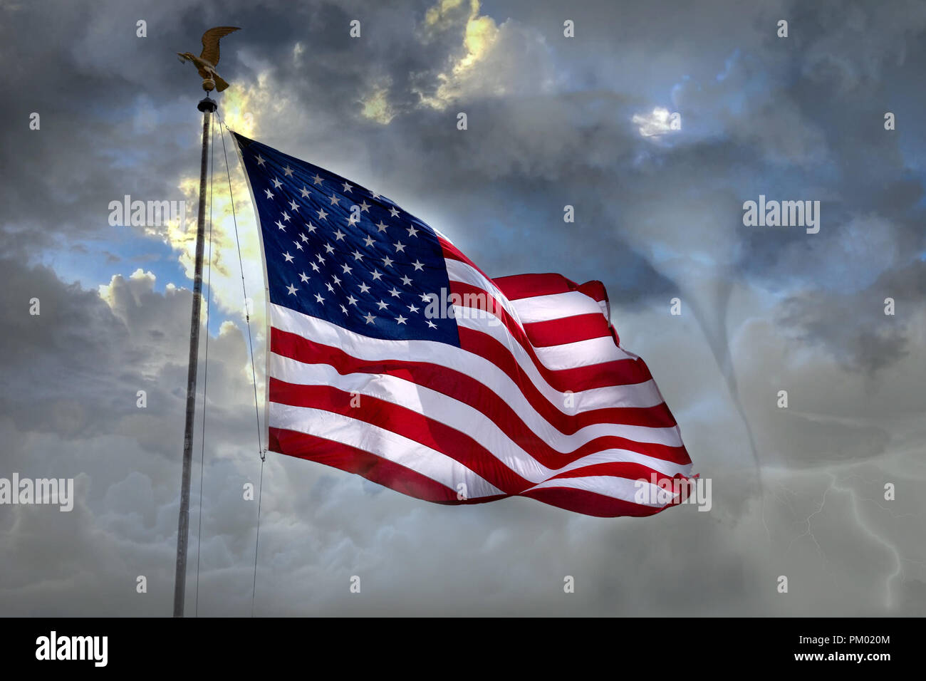Hurricane Cyclone tempest in usa town flag Stock Photo - Alamy