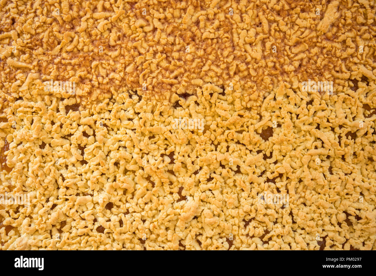 grated pie background. Food background. Bright orange color Stock Photo ...