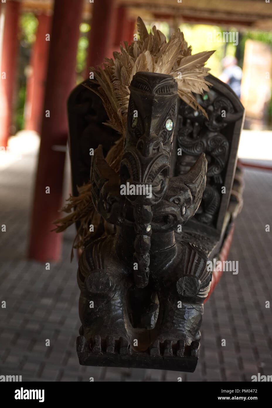frontal wood carving on a Waka in Te Puia, Rotorua Stock Photo - Alamy