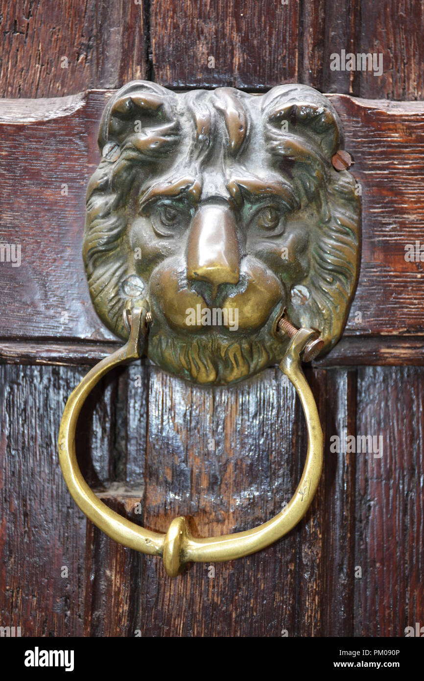 Old metal door handle Stock Photo - Alamy