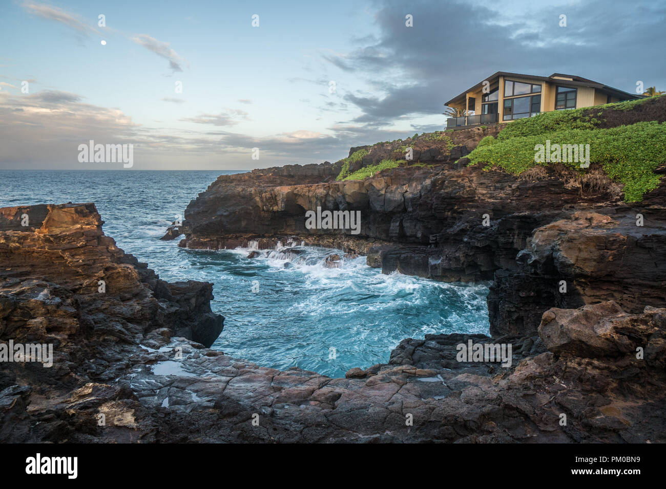 A rock cove formed from a collapsed lava tube on Kauai most southerly ...