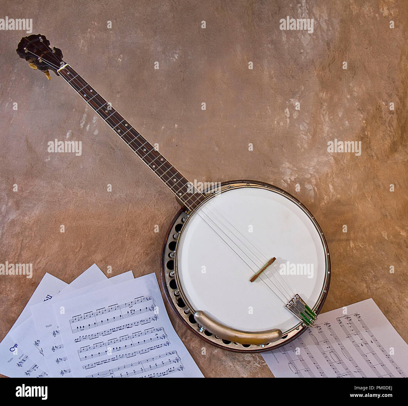 Close-up Images of Older Banjo different angles and some with music ...