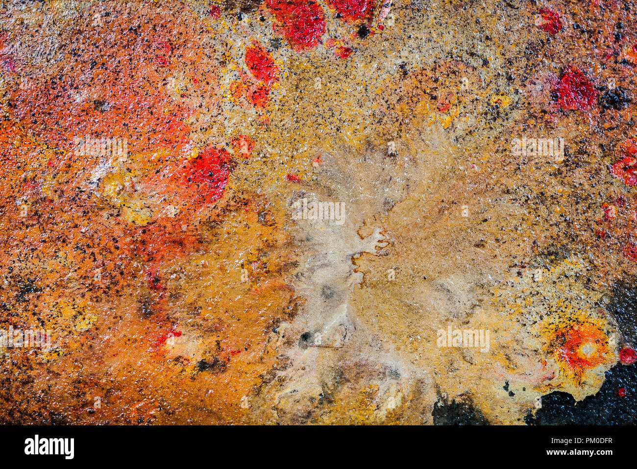 Yellow brown and red messy wall stucco texture background. Decorative ...