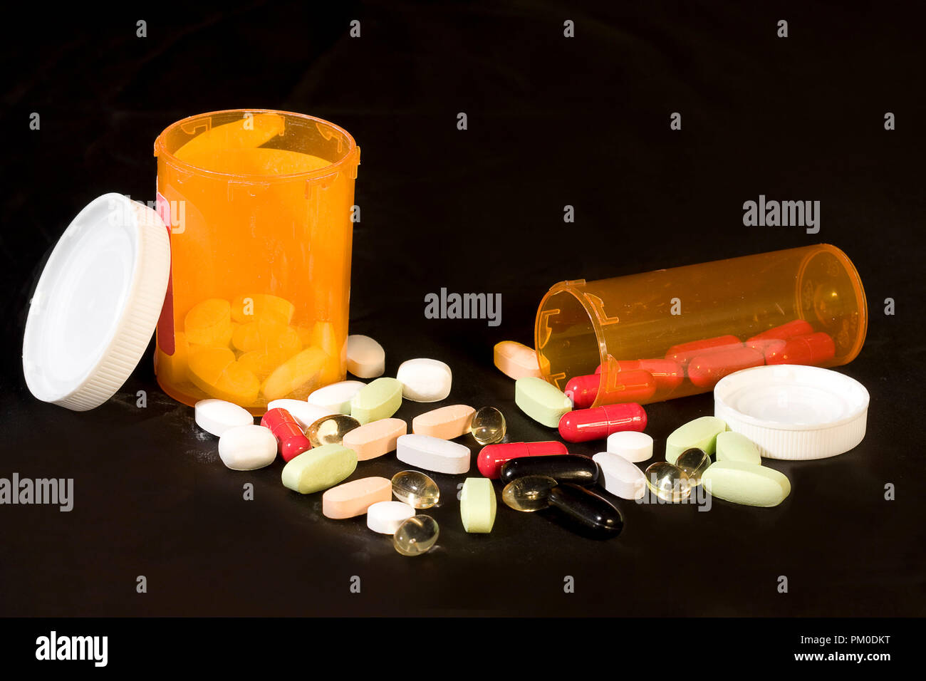 Pills containers caps hi-res stock photography and images - Alamy