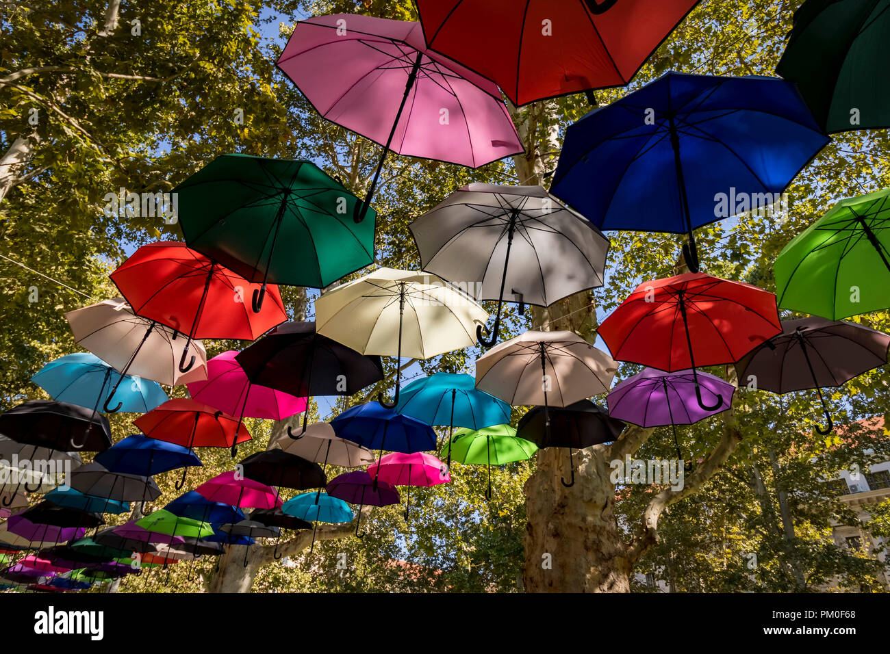 Colorful umbrellas in the sky Stock Photo - Alamy