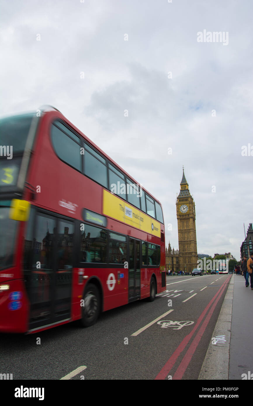 London, UK. October 201: Red Double Decker buses move along the ...
