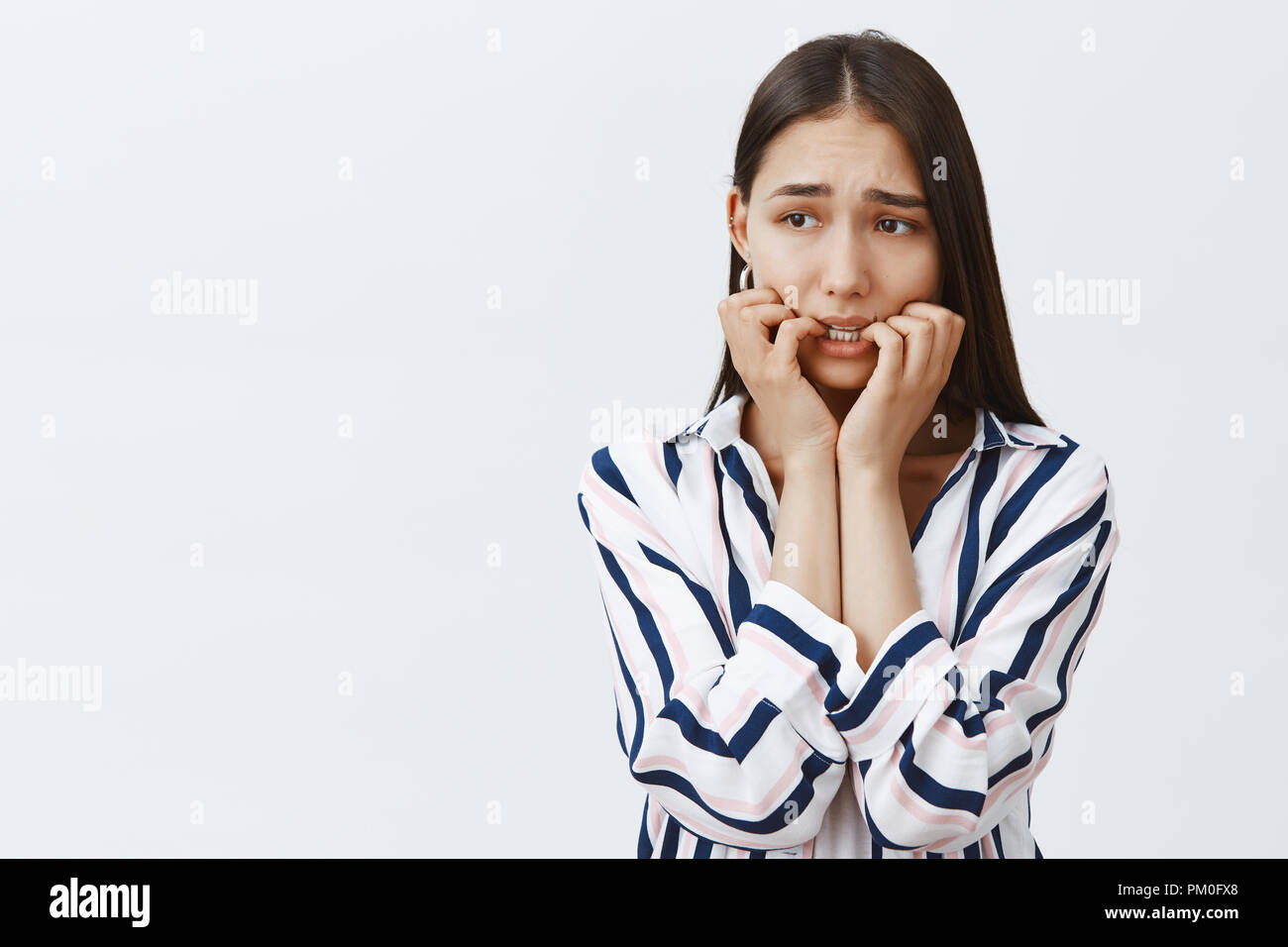 Girl witnessed crime, feeling anxious and afraid. Portrait of innocent ...